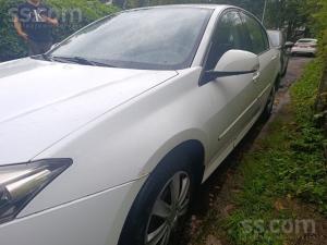 White Renault Laguna 2012 in Riga, with an engine capacity of 2.00 L and mileage of 280 thousand km for 1325 €, photo 3 on AUTOMOTO.COM.LV