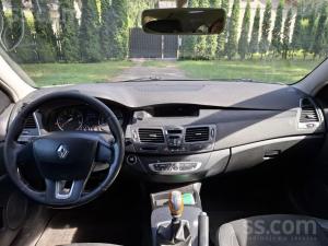 White Renault Laguna 2012 in Riga, with an engine capacity of 2.00 L and mileage of 318 thousand km for 3000 €, photo 6 on AUTOMOTO.COM.LV