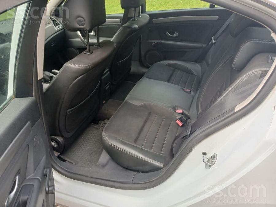 White Renault Laguna 2012 in Ogre, with an engine capacity of 2.00 L and mileage of 279 thousand km for 2800 €, photo 11 on AUTOMOTO.COM.LV
