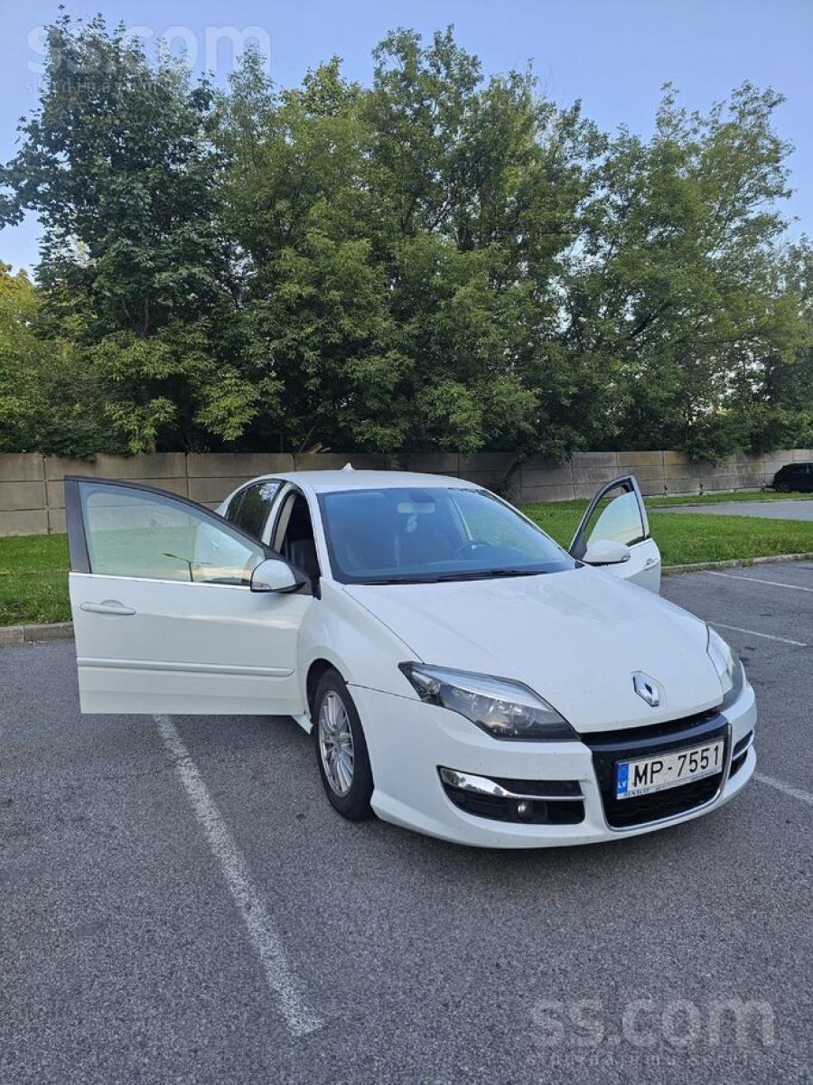 White Renault Laguna 2012 in Riga, with an engine capacity of 2.00 L and mileage of 233 thousand km for 2499 €, photo 1 on AUTOMOTO.COM.LV