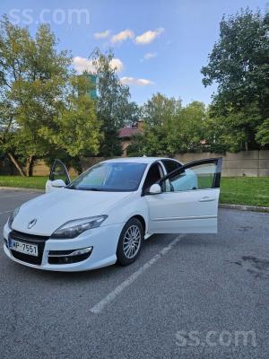 White Renault Laguna 2012 in Riga, with an engine capacity of 2.00 L and mileage of 233 thousand km for 2499 €, photo 3 on AUTOMOTO.COM.LV