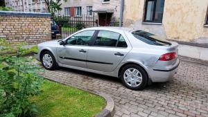 White Renault Laguna 2007 in Riga, with an engine capacity of 2.00 L and mileage of 214 thousand km for 950 €, photo 3 on AUTOMOTO.COM.LV