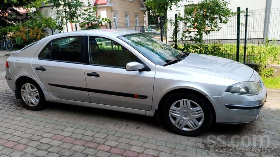 White Renault Laguna 2007 in Riga, with an engine capacity of 2.00 L and mileage of 214 thousand km for 950 €, photo 5 on AUTOMOTO.COM.LV
