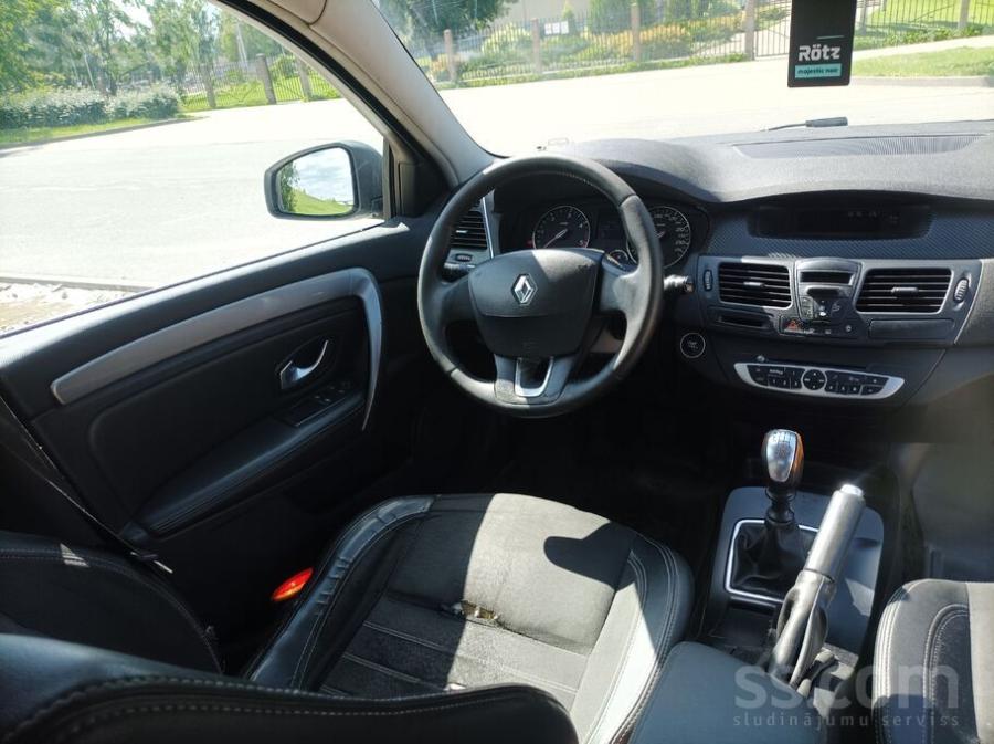 White Renault Laguna 2012 in Riga, with an engine capacity of 2.00 L and mileage of 360 thousand km for 1100 €, photo 6 on AUTOMOTO.COM.LV