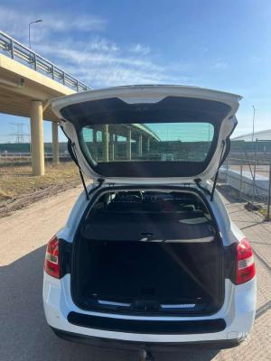White Renault Laguna 2008 in Marijampole, with an engine capacity of 1.46 L and mileage of 220 thousand km for 2050 €, photo 8 on AUTOMOTO.COM.LV
