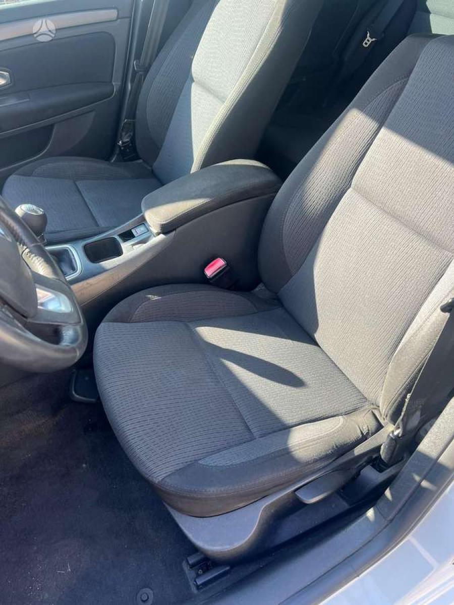 White Renault Laguna 2008 in Marijampole, with an engine capacity of 1.46 L and mileage of 220 thousand km for 2050 €, photo 10 on AUTOMOTO.COM.LV