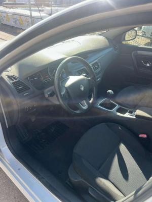 White Renault Laguna 2008 in Marijampole, with an engine capacity of 1.46 L and mileage of 220 thousand km for 2050 €, photo 12 on AUTOMOTO.COM.LV