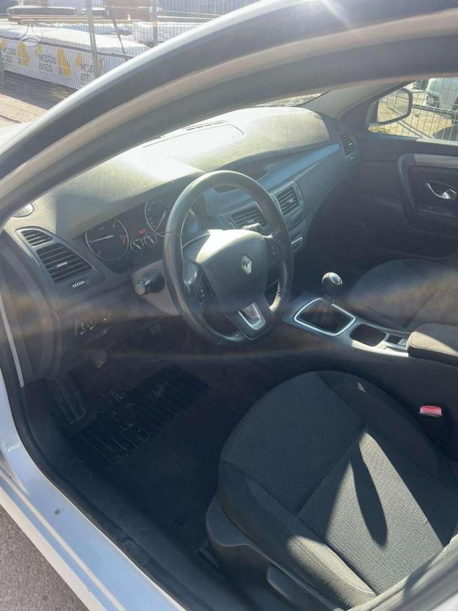 White Renault Laguna 2008 in Marijampole, with an engine capacity of 1.46 L and mileage of 220 thousand km for 2050 €, photo 12 on AUTOMOTO.COM.LV
