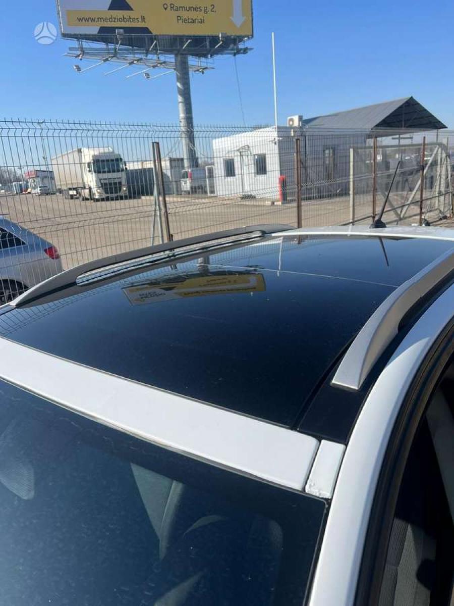 White Renault Laguna 2008 in Marijampole, with an engine capacity of 1.46 L and mileage of 220 thousand km for 2050 €, photo 16 on AUTOMOTO.COM.LV