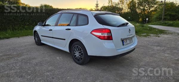 White Renault Laguna 2008 in Kuldiga, with an engine capacity of 1.50 L and mileage of 332 thousand km for 1660 €, photo 7 on AUTOMOTO.COM.LV