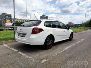 White Renault Laguna 2011 in Riga, with an engine capacity of 1.50 L and mileage of 286 thousand km for 2300 €, photo 4 on AUTOMOTO.COM.LV