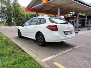 White Renault Laguna 2011 in Riga, with an engine capacity of 1.50 L and mileage of 286 thousand km for 2300 €, photo 5 on AUTOMOTO.COM.LV