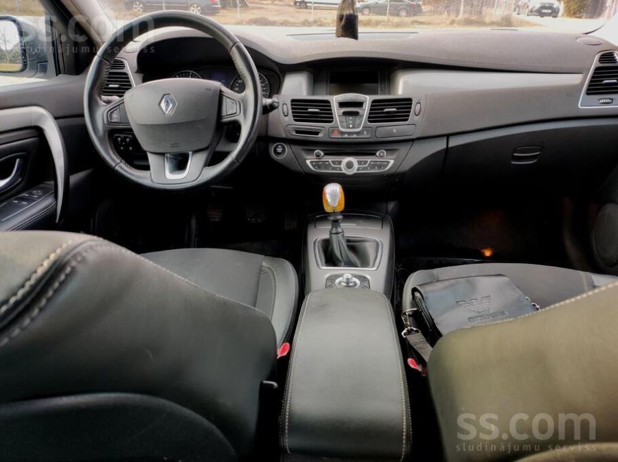 White Renault Laguna 2011 in Riga, with an engine capacity of 1.50 L and mileage of 286 thousand km for 2300 €, photo 6 on AUTOMOTO.COM.LV