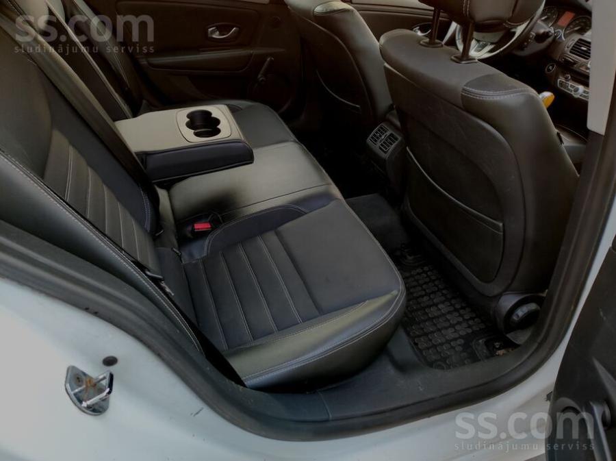 White Renault Laguna 2011 in Riga, with an engine capacity of 1.50 L and mileage of 286 thousand km for 2300 €, photo 8 on AUTOMOTO.COM.LV
