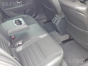 White Renault Laguna 2014 in Riga, with an engine capacity of 2.00 L and mileage of 245 thousand km for 5995 €, photo 6 on AUTOMOTO.COM.LV