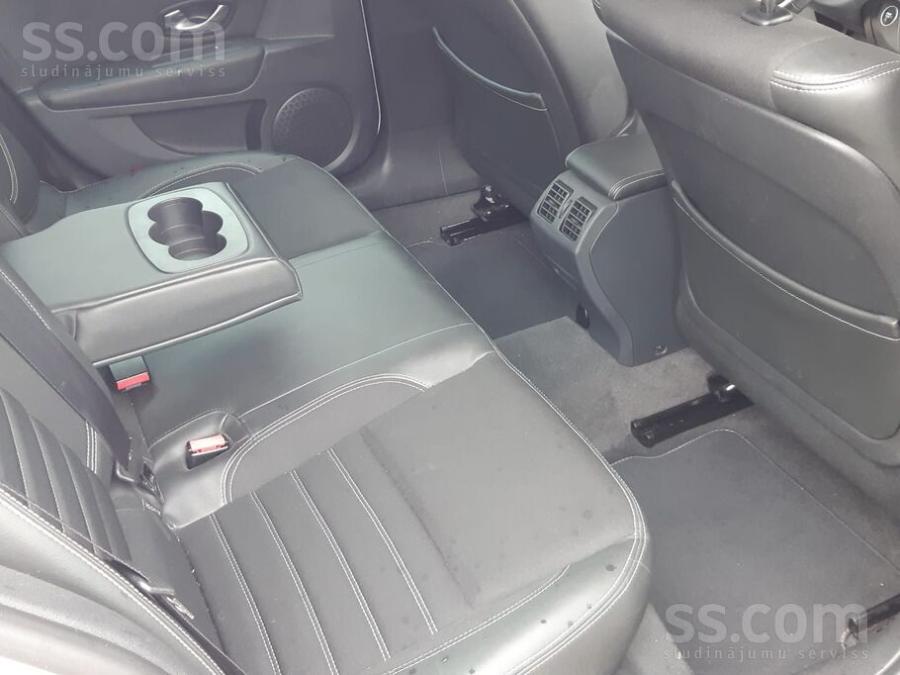 White Renault Laguna 2014 in Riga, with an engine capacity of 2.00 L and mileage of 245 thousand km for 5995 €, photo 6 on AUTOMOTO.COM.LV