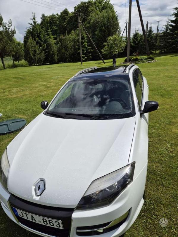 White Renault Laguna 2014 in Kelme, with an engine capacity of 2.00 L and mileage of 200 thousand km for 5350 €, photo 6 on AUTOMOTO.COM.LV