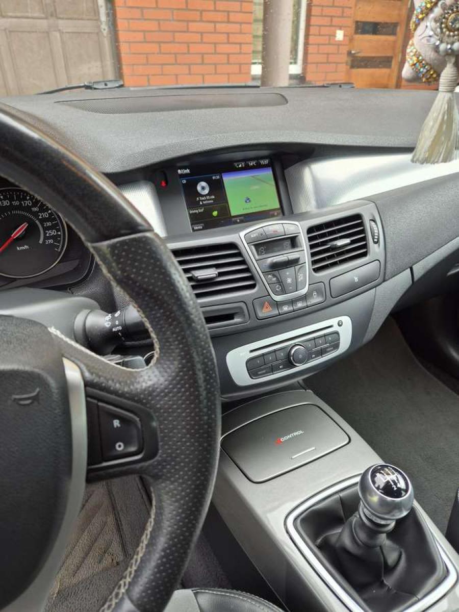 White Renault Laguna 2014 in Kelme, with an engine capacity of 2.00 L and mileage of 200 thousand km for 5350 €, photo 20 on AUTOMOTO.COM.LV