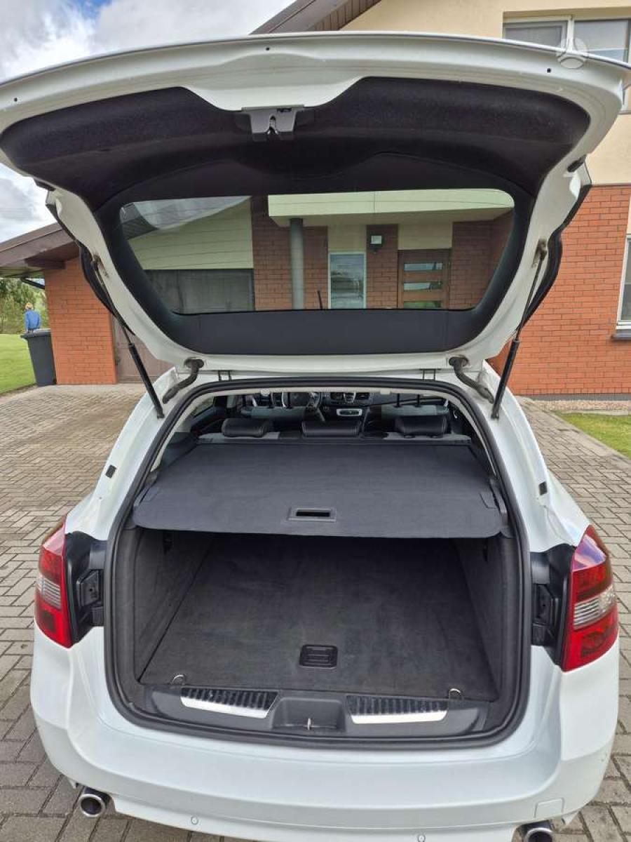 White Renault Laguna 2014 in Kelme, with an engine capacity of 2.00 L and mileage of 200 thousand km for 5350 €, photo 22 on AUTOMOTO.COM.LV