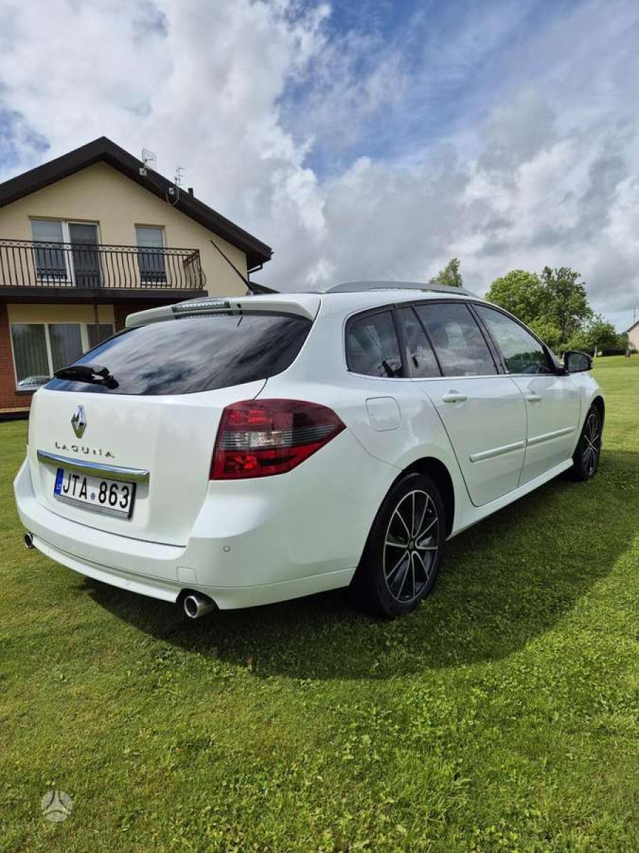 White Renault Laguna 2014 in Kelme, with an engine capacity of 2.00 L and mileage of 200 thousand km for 5350 €, photo 26 on AUTOMOTO.COM.LV