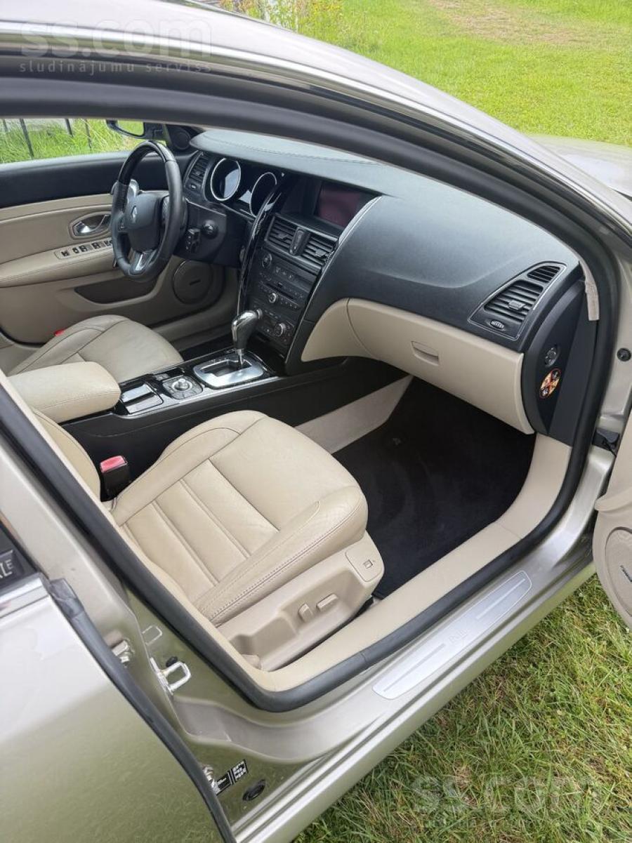 Yellow Renault Latitude 2011 in Riga, with an engine capacity of 3.00 L and mileage of 248 thousand km for 4200 €, photo 12 on AUTOMOTO.COM.LV