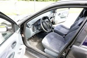 Black Renault Megane 1996 in Panevezys, with an engine capacity of 1.60 L and mileage of 260 thousand km for 600 €, photo 6 on AUTOMOTO.COM.LV