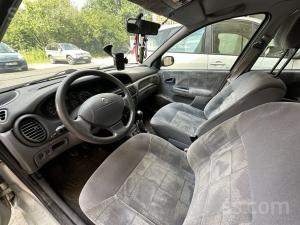 Grey Renault Megane 2001 in Riga, with an engine capacity of 1.40 L and mileage of 131 thousand km for 430 €, photo 7 on AUTOMOTO.COM.LV