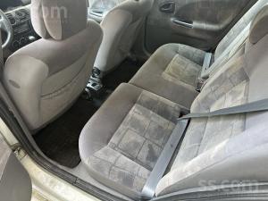 Grey Renault Megane 2001 in Riga, with an engine capacity of 1.40 L and mileage of 131 thousand km for 430 €, photo 8 on AUTOMOTO.COM.LV