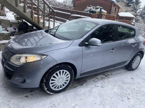 Grey Renault Megane 2009 in Marijampole, with an engine capacity of 1.60 L and mileage of 113 thousand km for 3400 €, photo 1 on AUTOMOTO.COM.LV