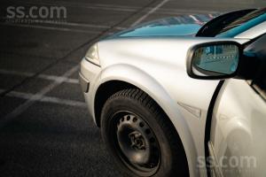 Pelēks Renault Megane 2008 Rīga, ar dzinēja tilpumu 1.60 L un nobraukumu 148 tūkst. km par 900 €, foto 13 vietnē AUTOMOTO.COM.LV