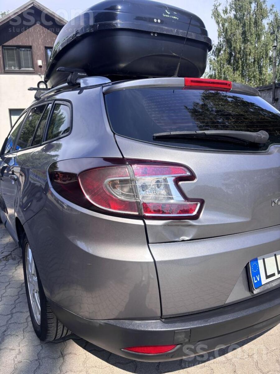 Grey Renault Megane 2010 in Riga, with an engine capacity of 1.50 L and mileage of 323 thousand km for 2500 €, photo 3 on AUTOMOTO.COM.LV