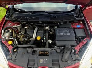 Red Renault Megane 2010 in Ogre, with an engine capacity of 1.50 L and mileage of 216 thousand km for 1950 €, photo 10 on AUTOMOTO.COM.LV