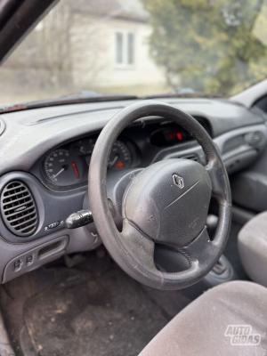 Red Renault Megane 2000 in Kaunas, with an engine capacity of 1.60 L and mileage of 295 thousand km for 550 €, photo 12 on AUTOMOTO.COM.LV