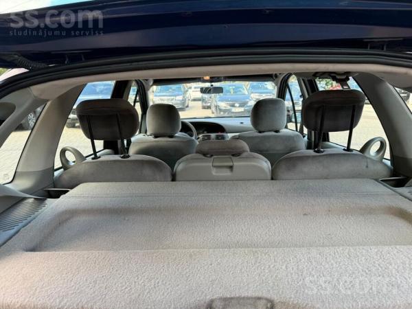 Blue Renault Scenic 2002 in Daugavpils, with an engine capacity of 1.40 L and mileage of 219 thousand km for 990 €, photo 11 on AUTOMOTO.COM.LV