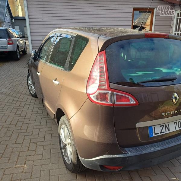 Brūns Renault Scenic 2010 Panevēža, ar dzinēja tilpumu 1.90 L un nobraukumu 157 tūkst. km par 4950 €, foto 4 vietnē AUTOMOTO.COM.LV
