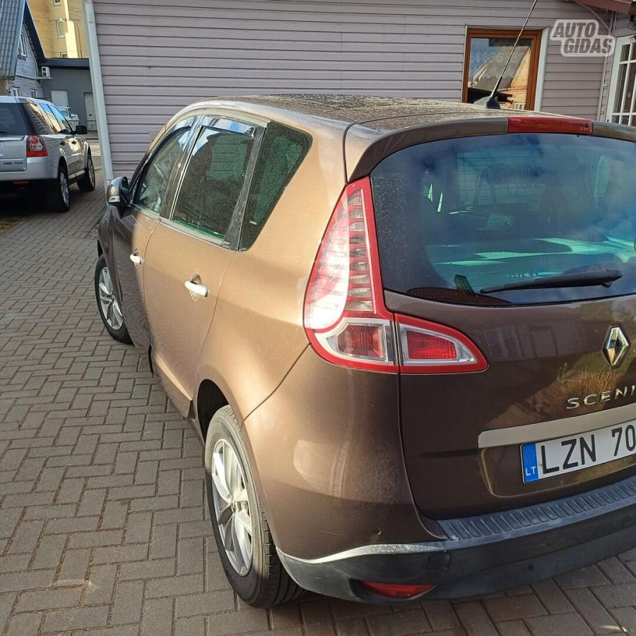 Brown Renault Scenic 2010 in Panevezys, with an engine capacity of 1.90 L and mileage of 157 thousand km for 4950 €, photo 5 on AUTOMOTO.COM.LV