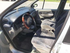 Grey Renault Scenic 2000 in Jonava, with an engine capacity of 1.90 L and mileage of 228 thousand km for 900 €, photo 7 on AUTOMOTO.COM.LV