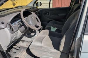 Grey Renault Scenic 2002 in Druskininkai, with an engine capacity of 1.87 L and mileage of 275 thousand km for 600 €, photo 7 on AUTOMOTO.COM.LV