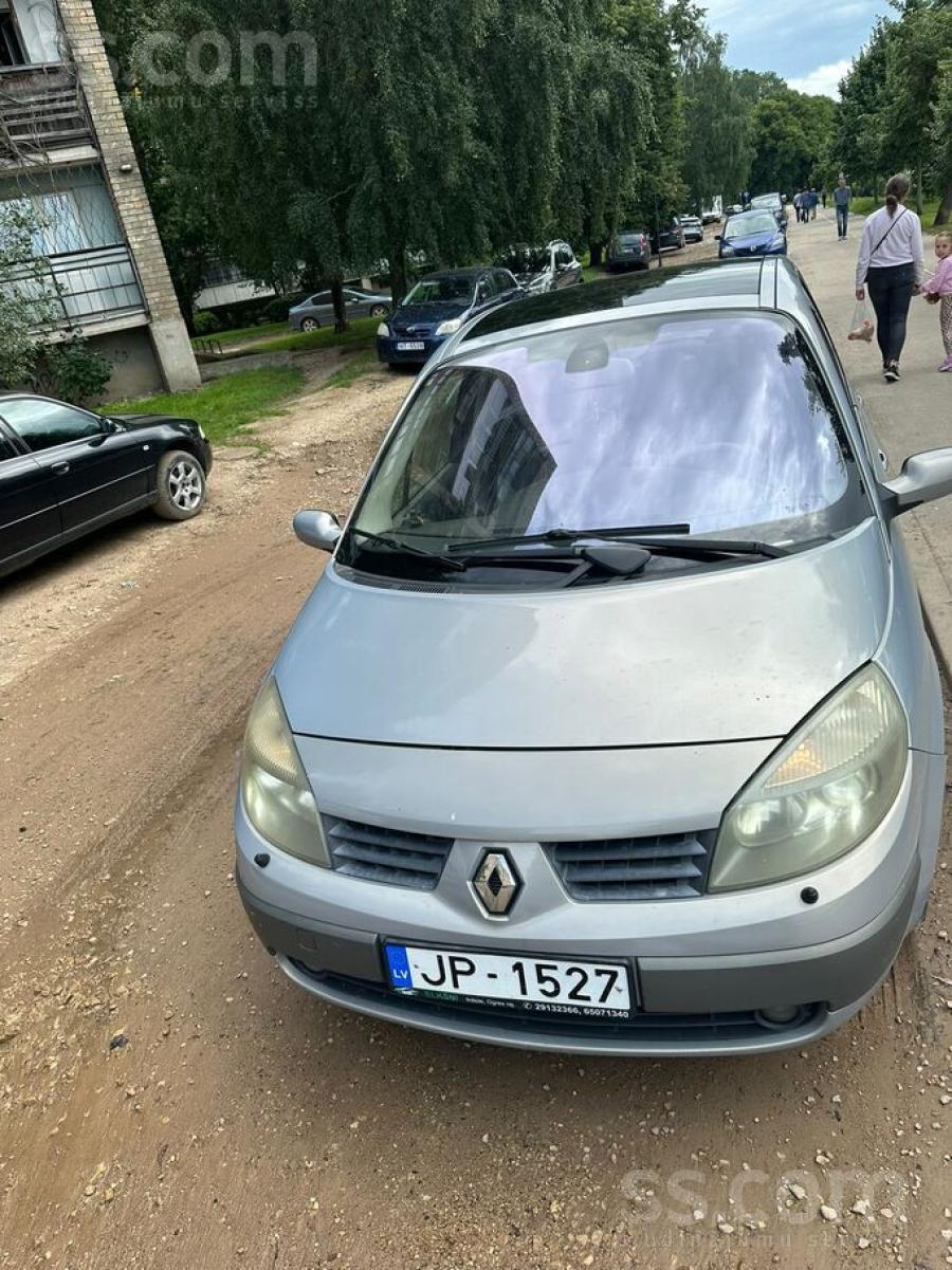 Pelēks Renault Scenic 2004 Rīga, ar dzinēja tilpumu 1.90 L un nobraukumu 179 tūkst. km par 1100 €, foto 1 vietnē AUTOMOTO.COM.LV