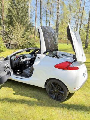 White Renault Wind 2011 in Riga, with an engine capacity of 1.40 L and mileage of 158 thousand km for 4000 €, photo 3 on AUTOMOTO.COM.LV