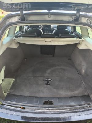 Black Saab 9-3 2007 in Dobele, with an engine capacity of 1.90 L and mileage of 328 thousand km for 2000 €, photo 12 on AUTOMOTO.COM.LV
