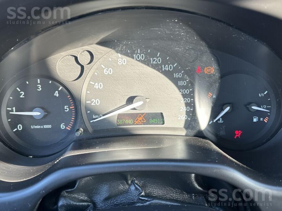 Grey Saab 9-3 2004 in Riga, with an engine capacity of 2.20 L and mileage of 387 thousand km for 1300 €, photo 11 on AUTOMOTO.COM.LV