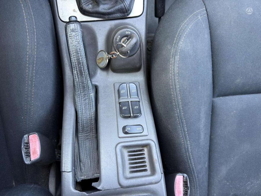 Black Saab 9-5 2003 in Panevezys, with an engine capacity of 2.17 L and mileage of 304 thousand km for 850 €, photo 24 on AUTOMOTO.COM.LV