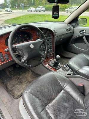 Grey Saab 9-5 2000 in Vilnius, with an engine capacity of 2.30 L and mileage of 389 thousand km for 600 €, photo 14 on AUTOMOTO.COM.LV
