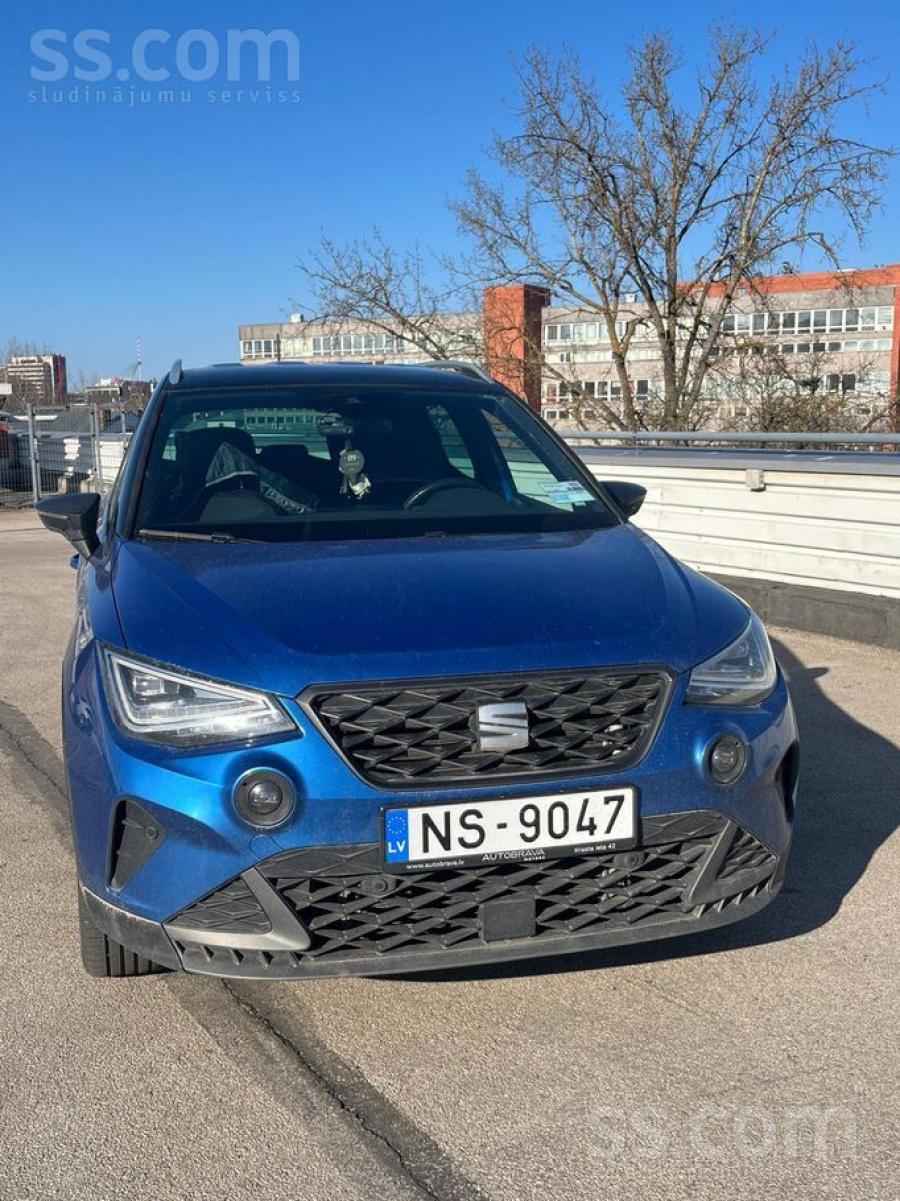 Blue SEAT Arona 2021 in Riga, with an engine capacity of 1.00 L and mileage of 62 thousand km for 15500 €, photo 1 on AUTOMOTO.COM.LV