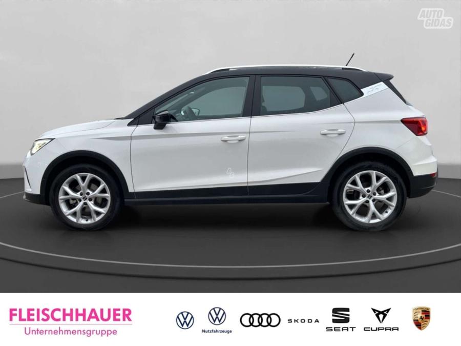 White SEAT Arona 2023 in Kaunas, with an engine capacity of 1.00 L and mileage of 14 thousand km for 25469 €, photo 3 on AUTOMOTO.COM.LV
