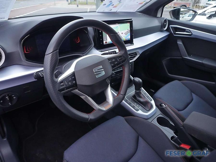 White SEAT Arona 2024 in Kaunas, with an engine capacity of 1.00 L and mileage of 12 thousand km for 23306 €, photo 7 on AUTOMOTO.COM.LV