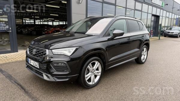 SEAT Ateca 2022 in Riga on AUTOMOTO.COM.LV Black SEAT Ateca 2022 in Riga, with an engine capacity of 2.00 L and mileage of 83 thousand km for 20900 €, photo 1 on AUTOMOTO.COM.LV