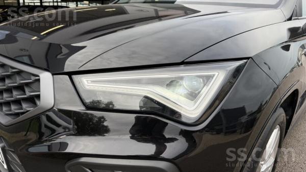 SEAT Ateca 2022 in Riga on AUTOMOTO.COM.LV Black SEAT Ateca 2022 in Riga, with an engine capacity of 2.00 L and mileage of 83 thousand km for 20900 €, photo 11 on AUTOMOTO.COM.LV