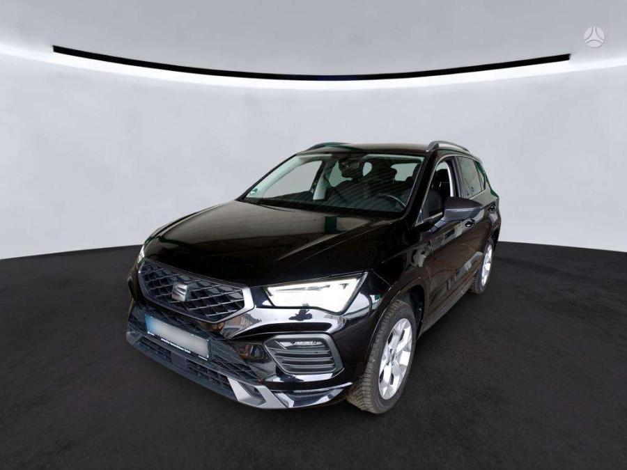 Black SEAT Ateca 2023 in Vilnius, with an engine capacity of 1.50 L and mileage of 100 thousand km for 21660 €, photo 1 on AUTOMOTO.COM.LV